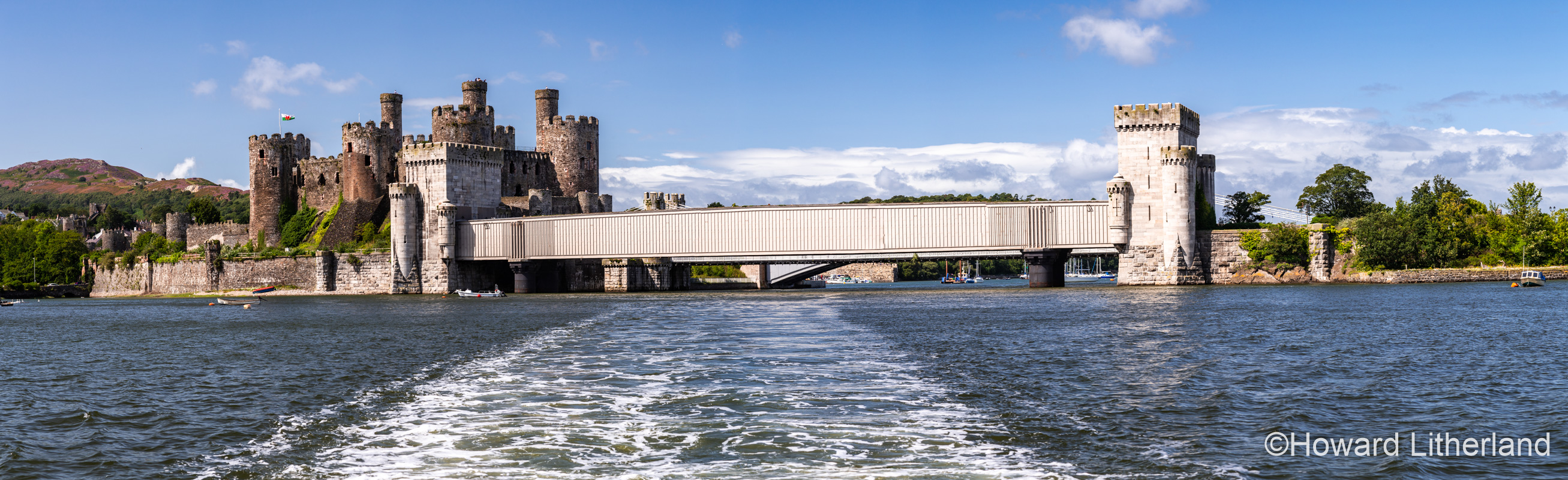 Conway castle and railway bridge from the Conwy estuary, North Wales